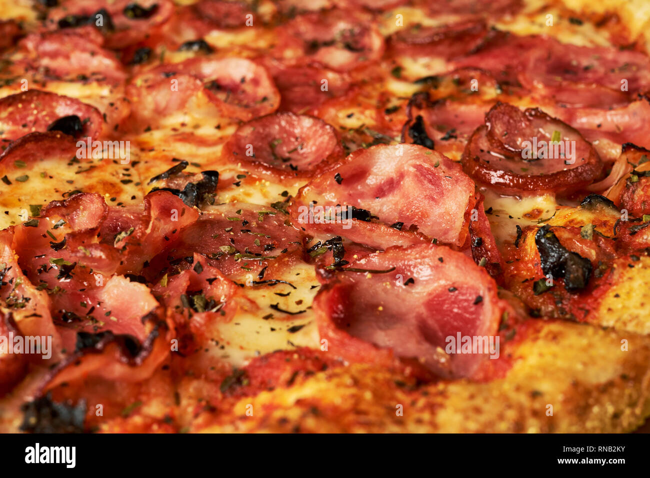 Appetizing background pepperoni pizza closeup filling the frame Stock ...