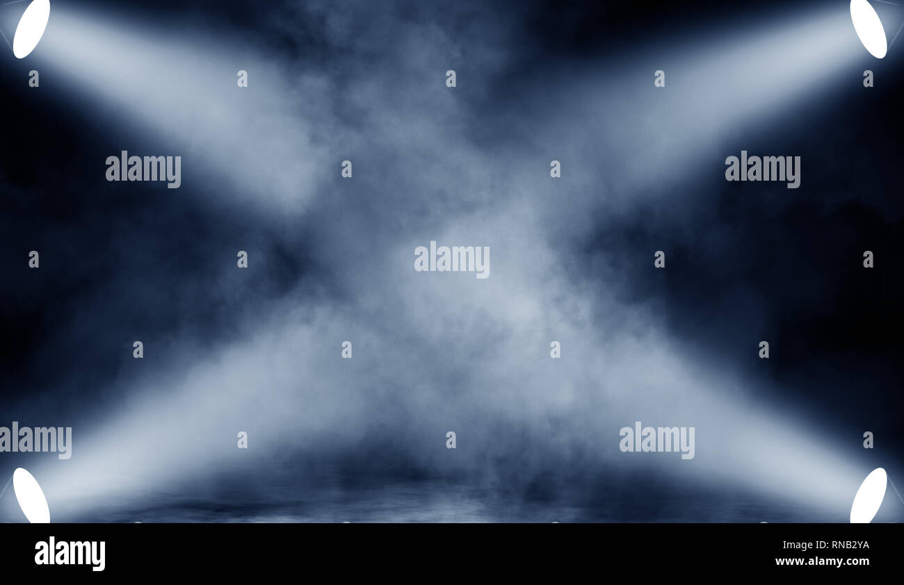 Projector spotlight on the floor . Beautfiul blue performance stage ...