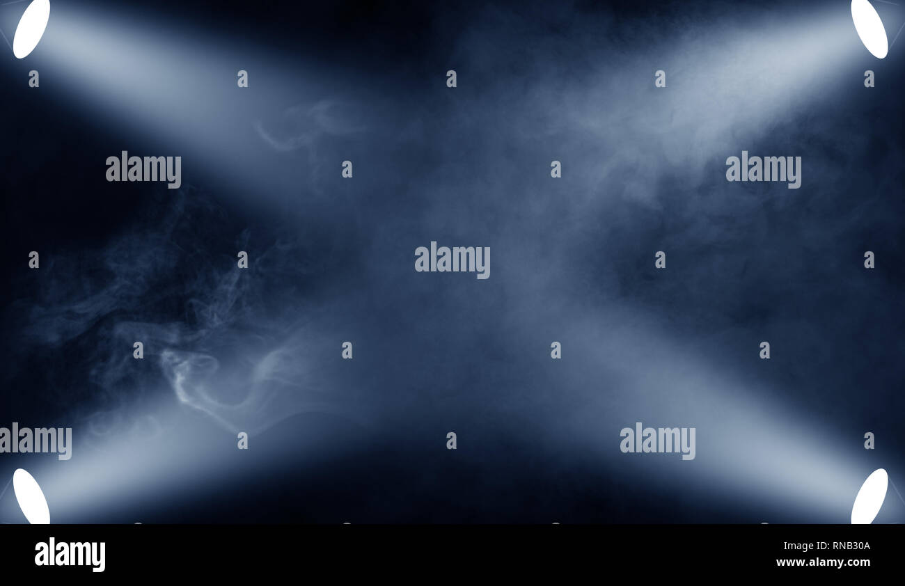 Projector spotlight on the floor . Beautfiul blue performance stage ...