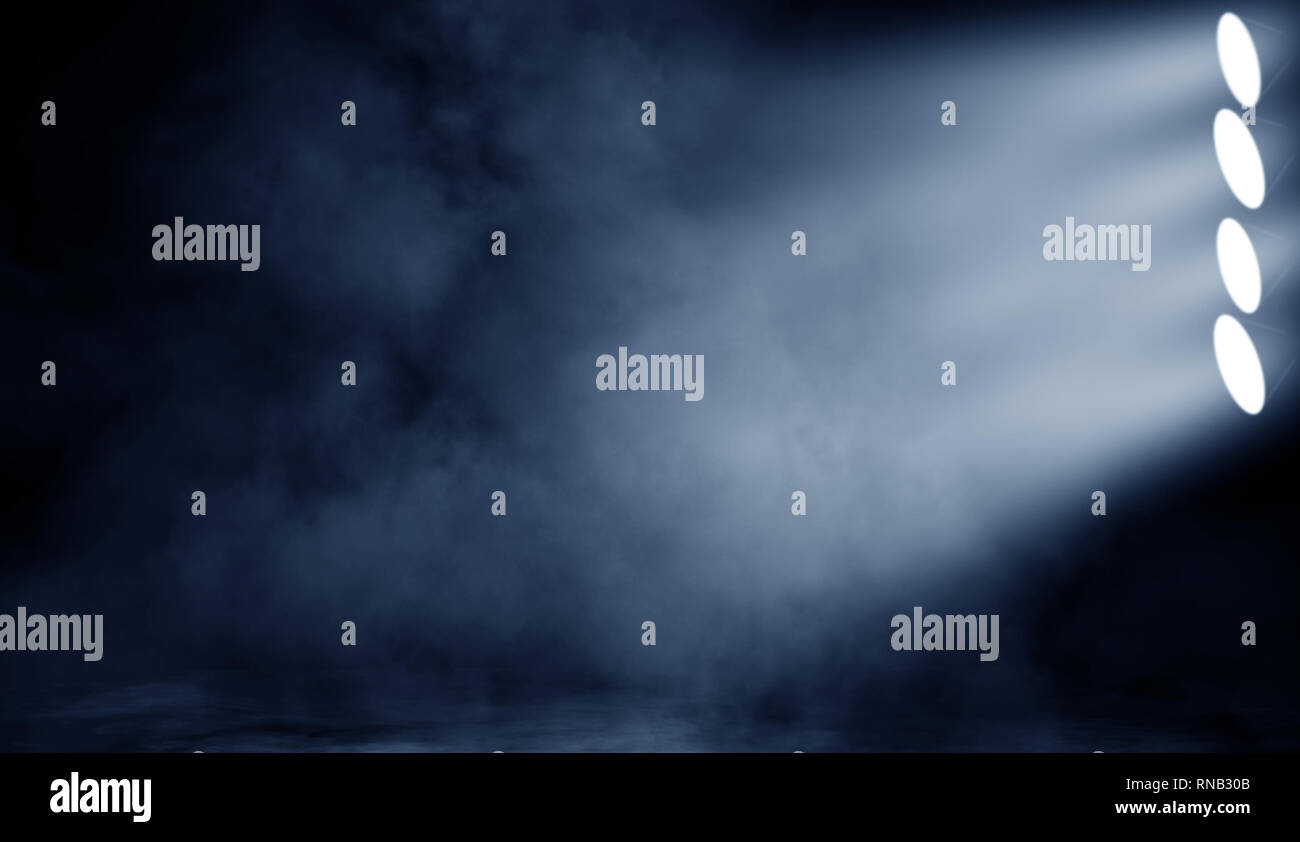 Projector spotlight on the floor . Beautfiul blue performance stage ...