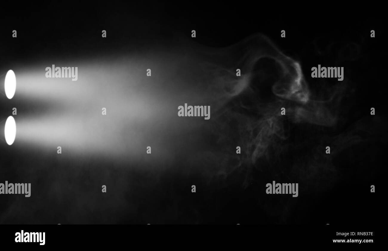 Misty projector . Spotlight with smoke fog effect. Isolated on black ...
