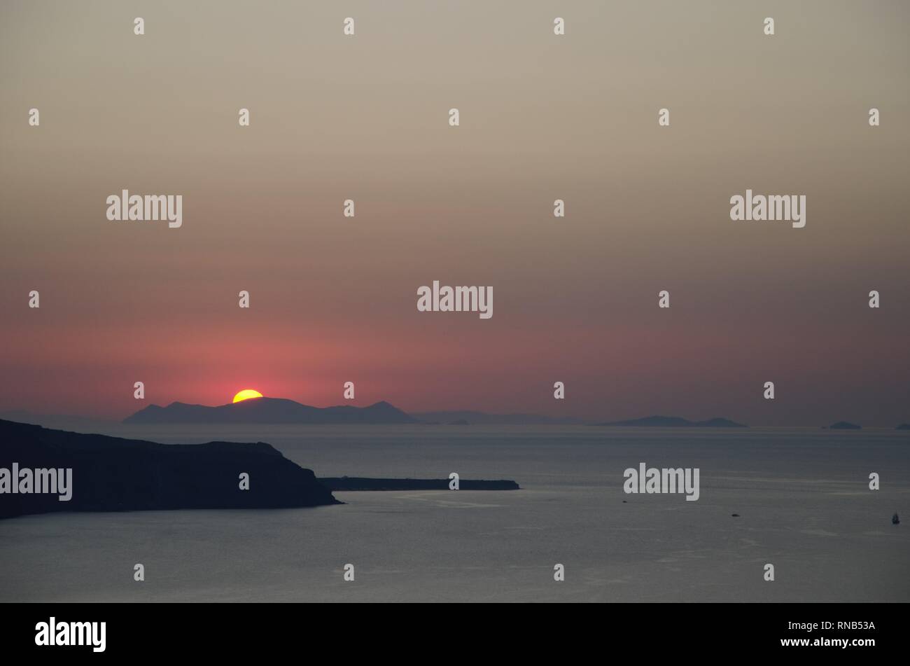 Beautiful sunset over Santorini Stock Photo - Alamy