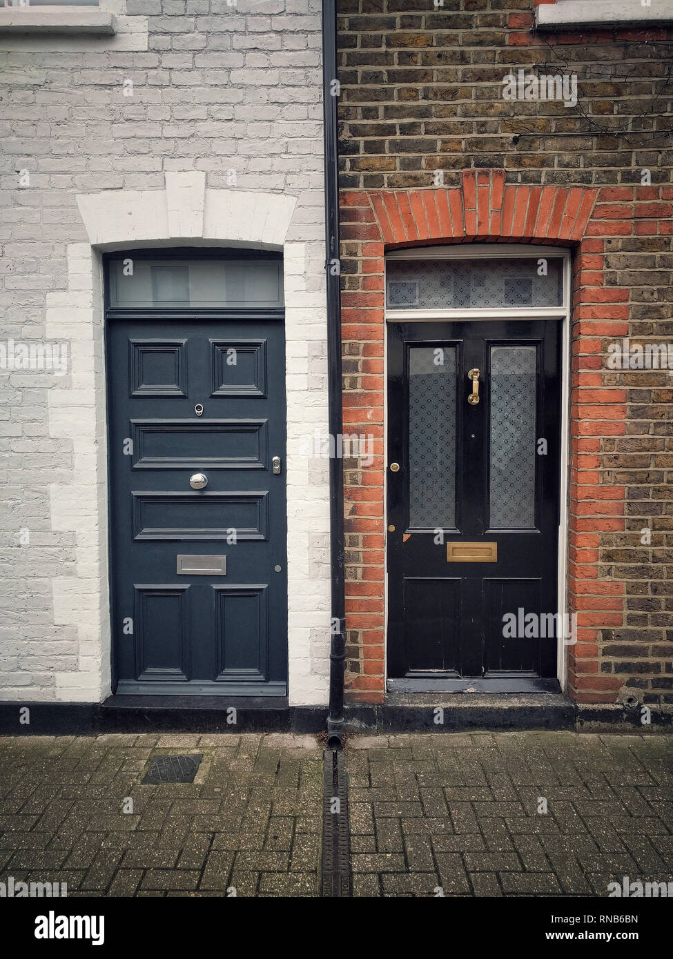 Color image of two doors on a building facade Stock Photo - Alamy