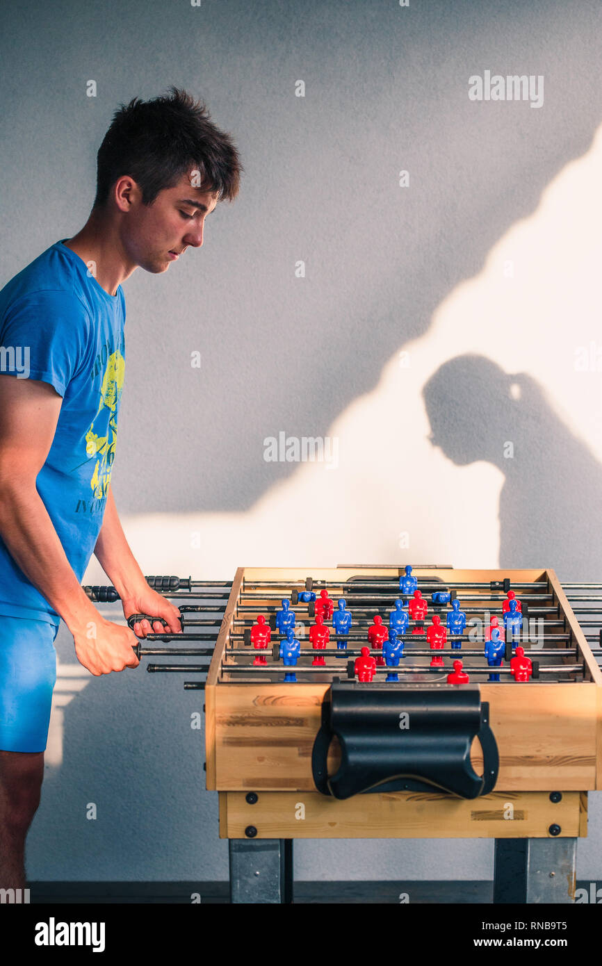 Teen boy playing soccer hi-res stock photography and images - Alamy