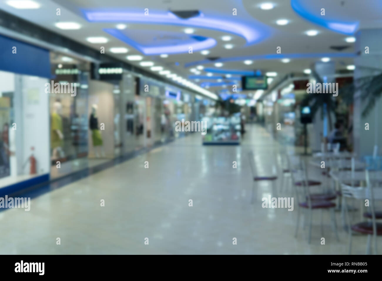 Blur shopping mall interior, blurred texture. Inside city store center ...