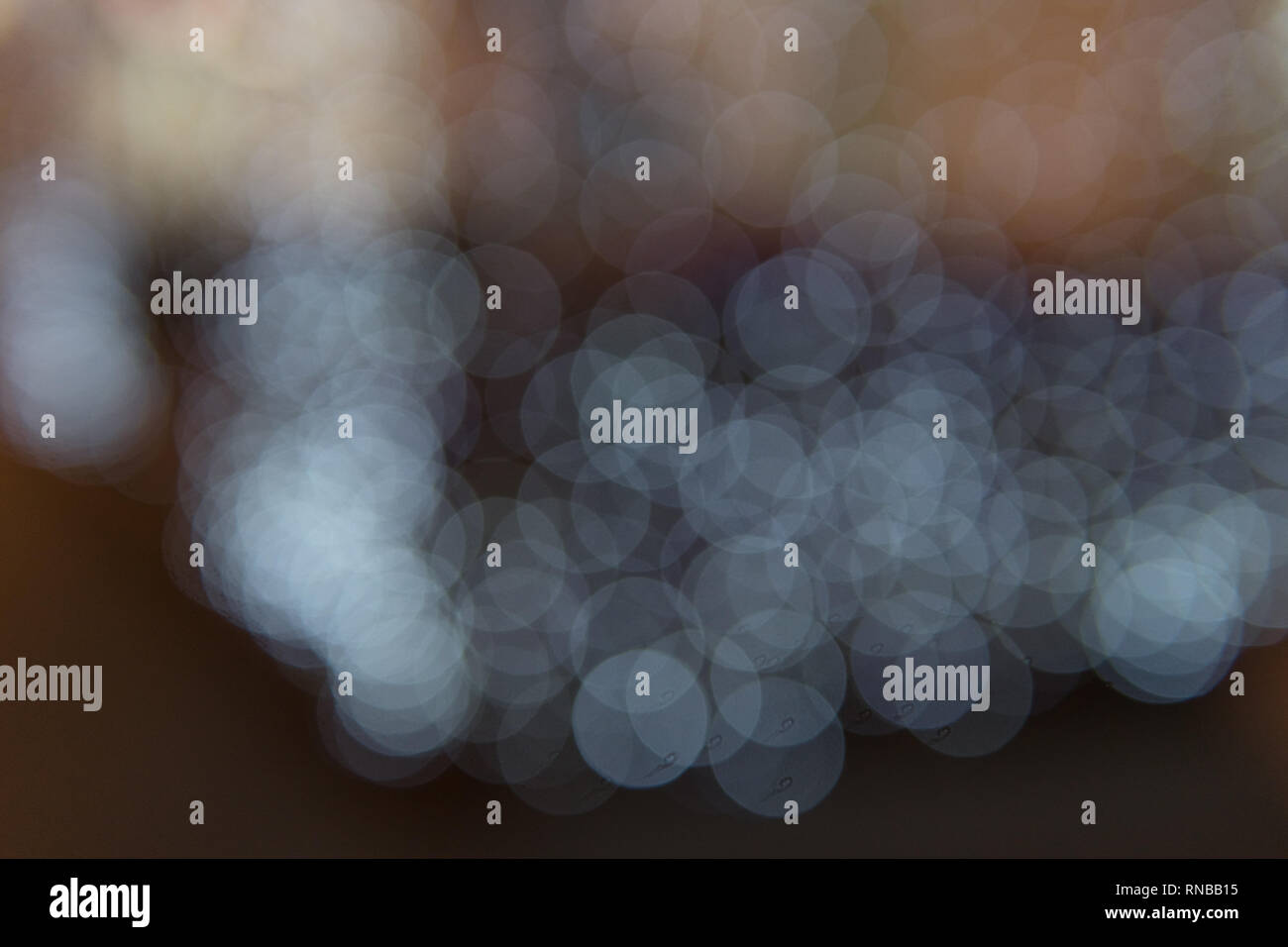 Blur white lights, defocused dots abstract texture. Shiny sparkles ...