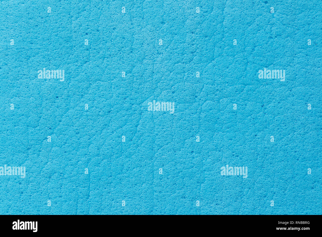 Texture of blue sponge for cleaning close-up Stock Photo - Alamy