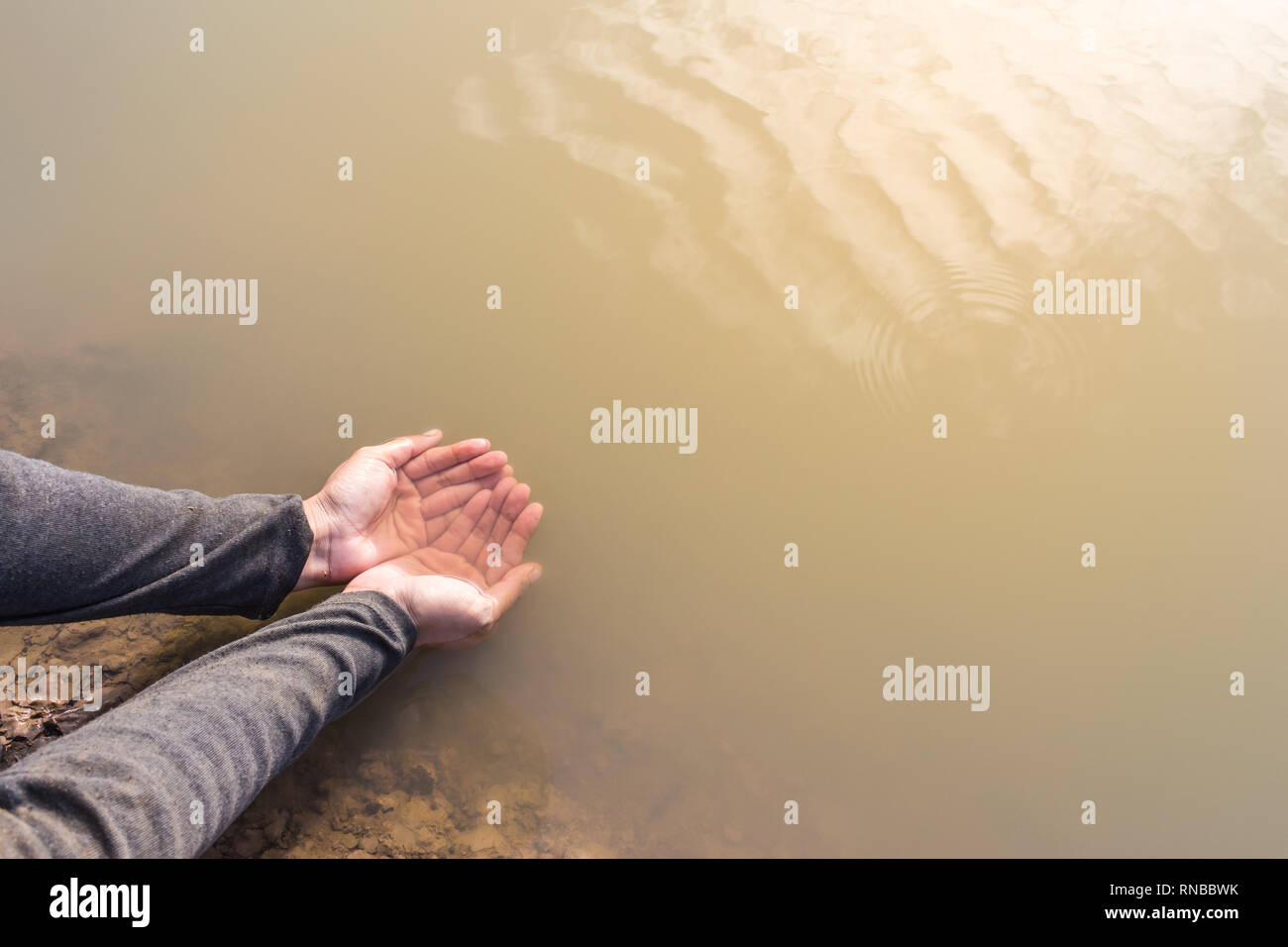 Child hands cupped water hi-res stock photography and images - Alamy