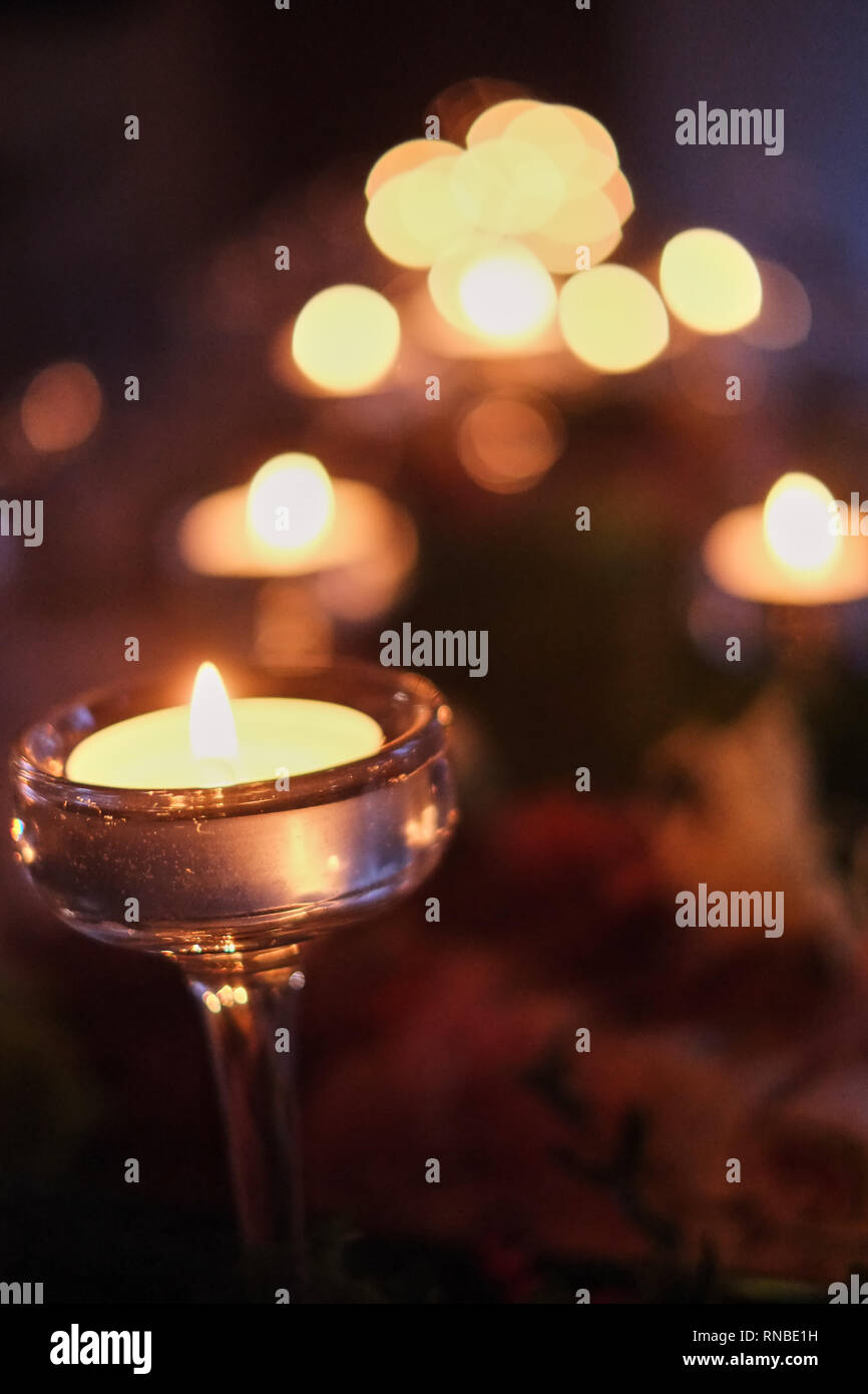 Alignment of burning candle lights, serenity symbols Stock Photo - Alamy