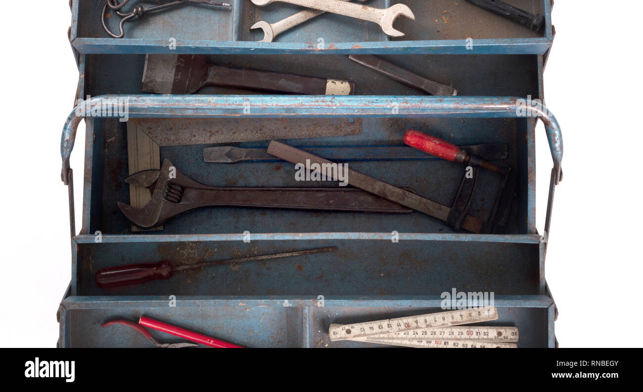 Old toolbox filled with vintage tools, isolated Stock Photo - Alamy
