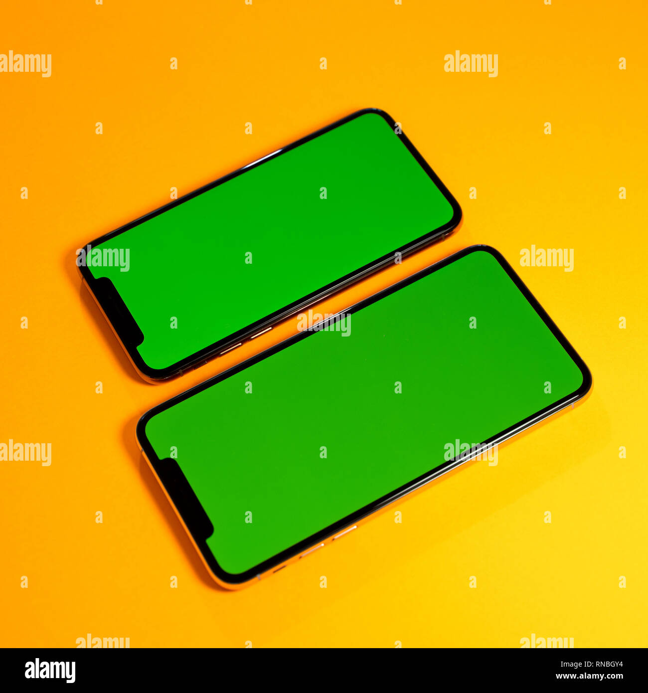 Green chroma key on new mobile smartphne as hero object on bright ...