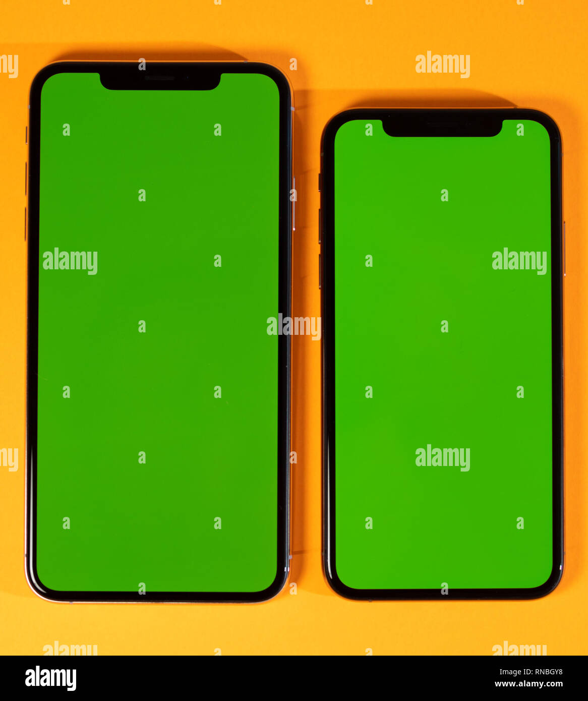 Green chroma key screen on new mobile smartphne hero object on bright ...