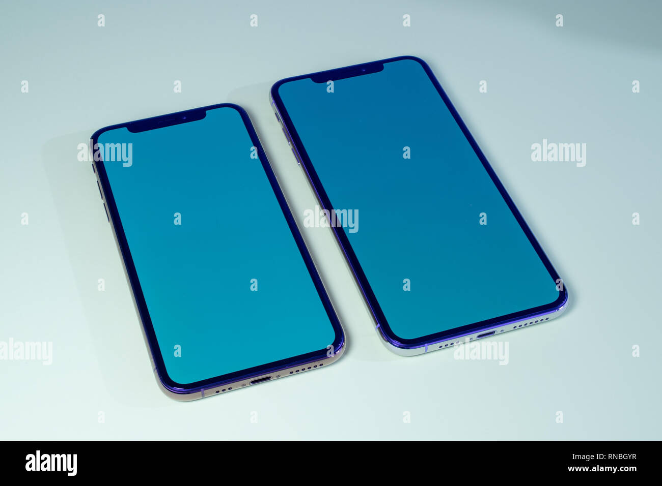 Blue screen on new smartphne as hero object on bright glamorous modern ...