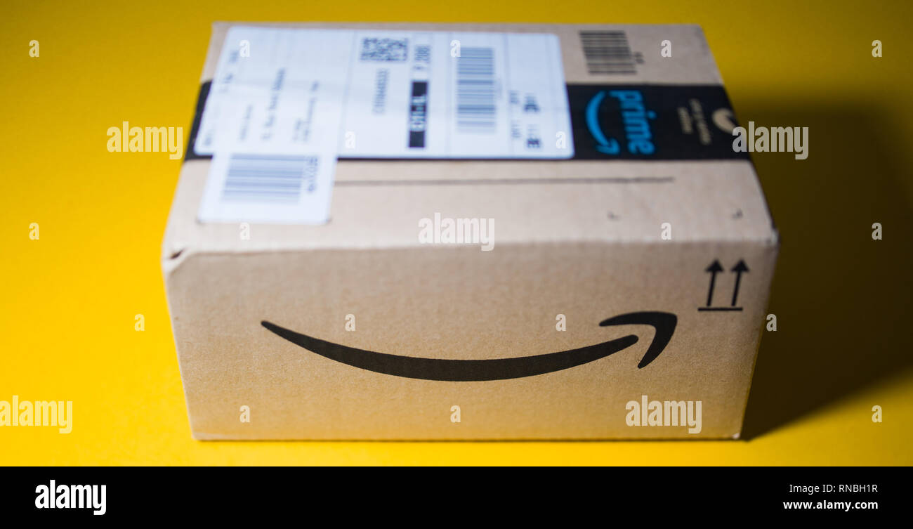 PARIS, FRANCE - SEP 28, 2018: Front view of new Amazon Cardboard box ...