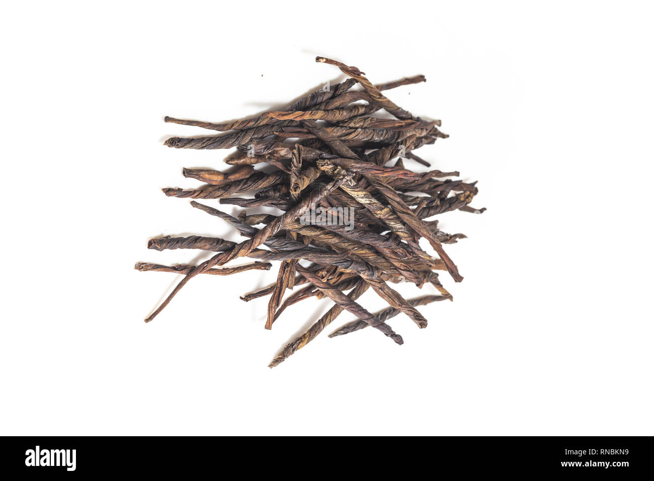 Dried chinese tea leave on white background Stock Photo - Alamy