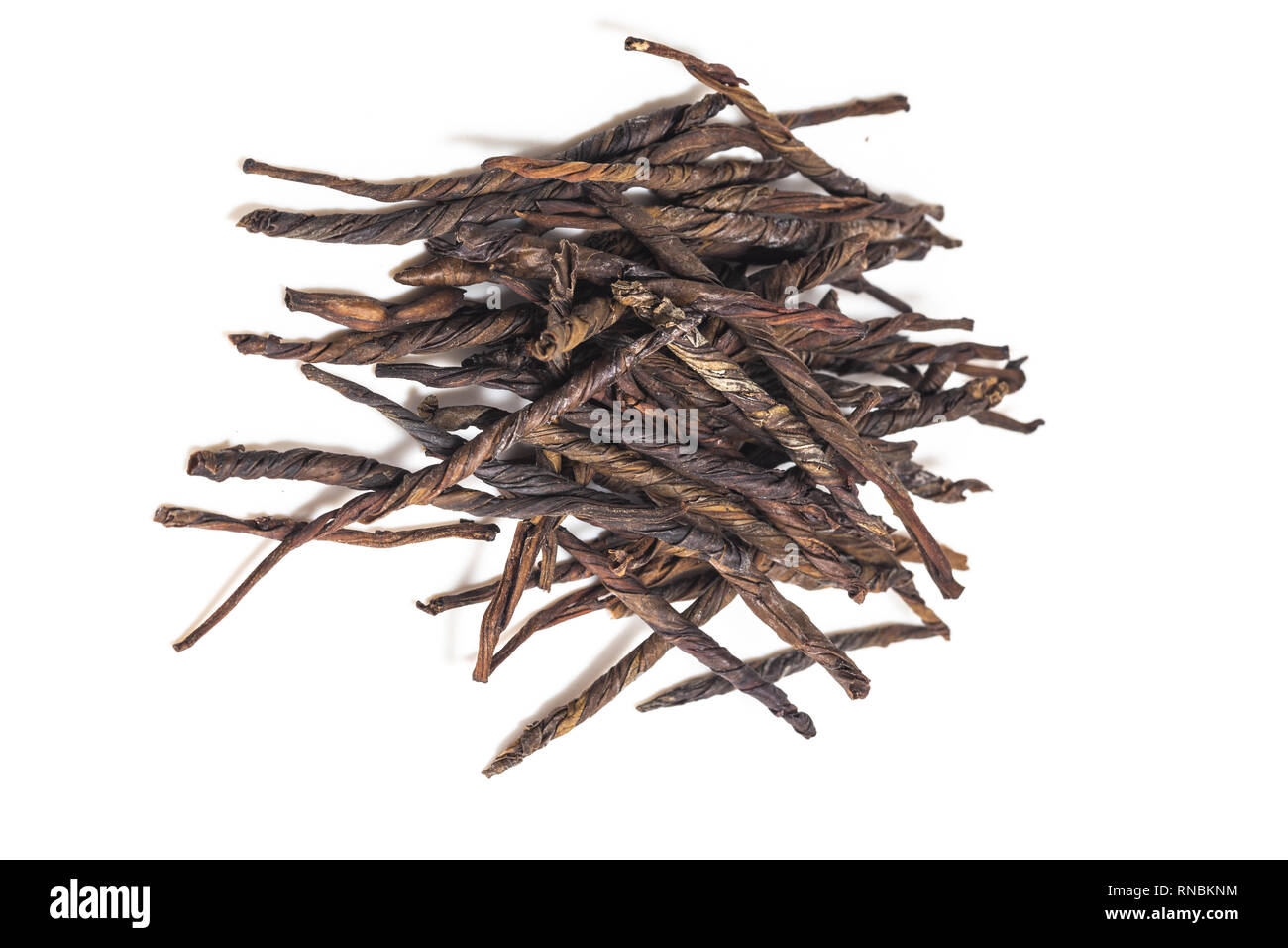 Dried chinese tea leave on white background Stock Photo - Alamy