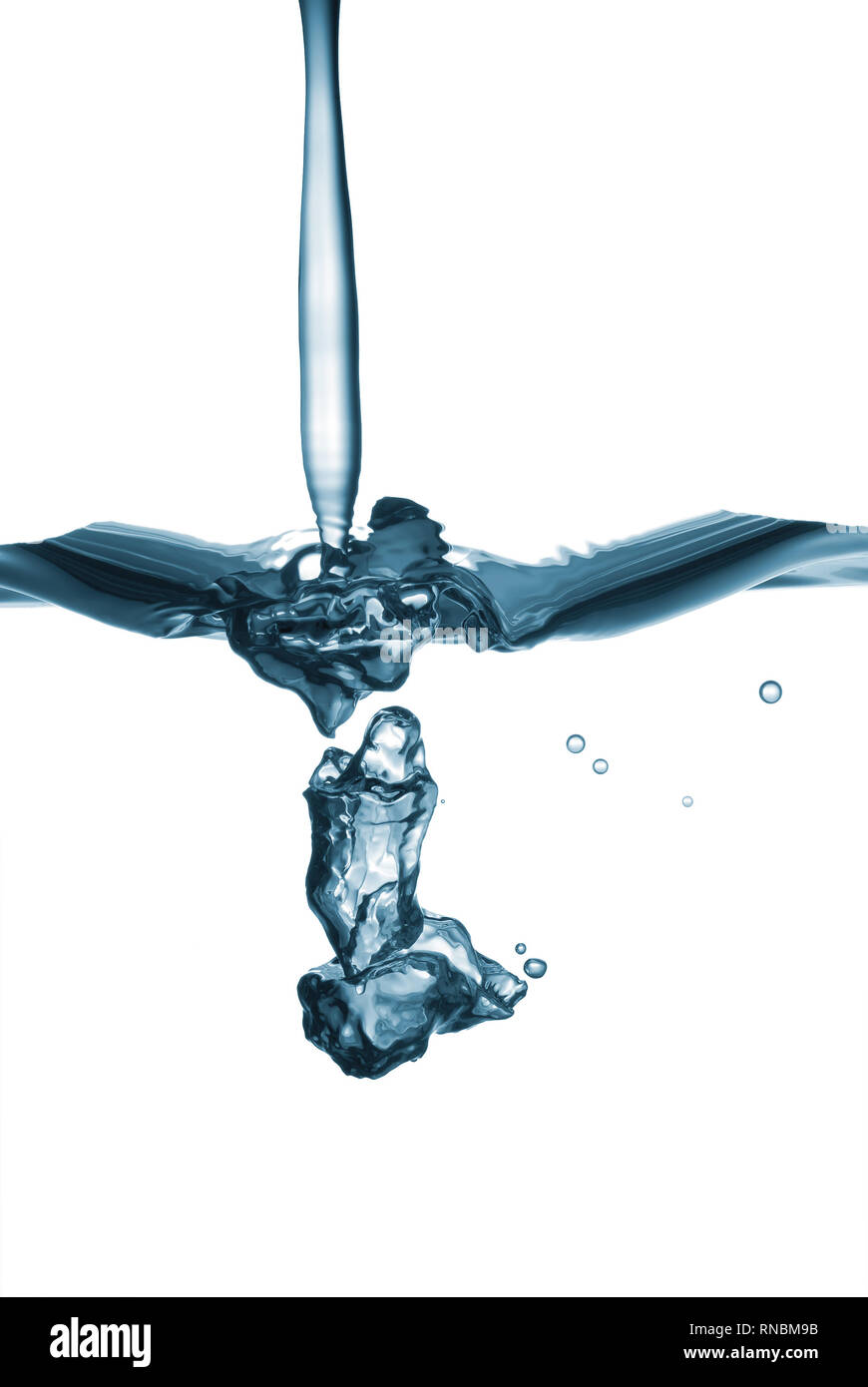 Water splash. Liquid poured into vessel. View through glass wall ...