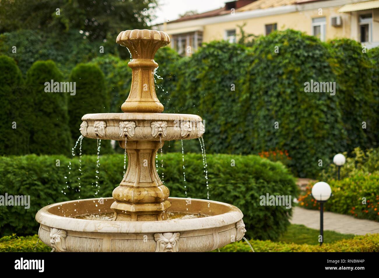 antique little waterfall in the garden falling drops Stock Photo - Alamy