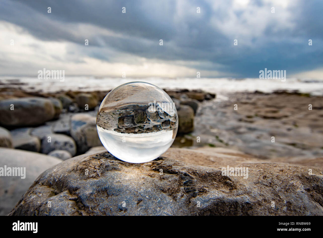crystal ball reflections - monknash beach south wales Stock Photo - Alamy