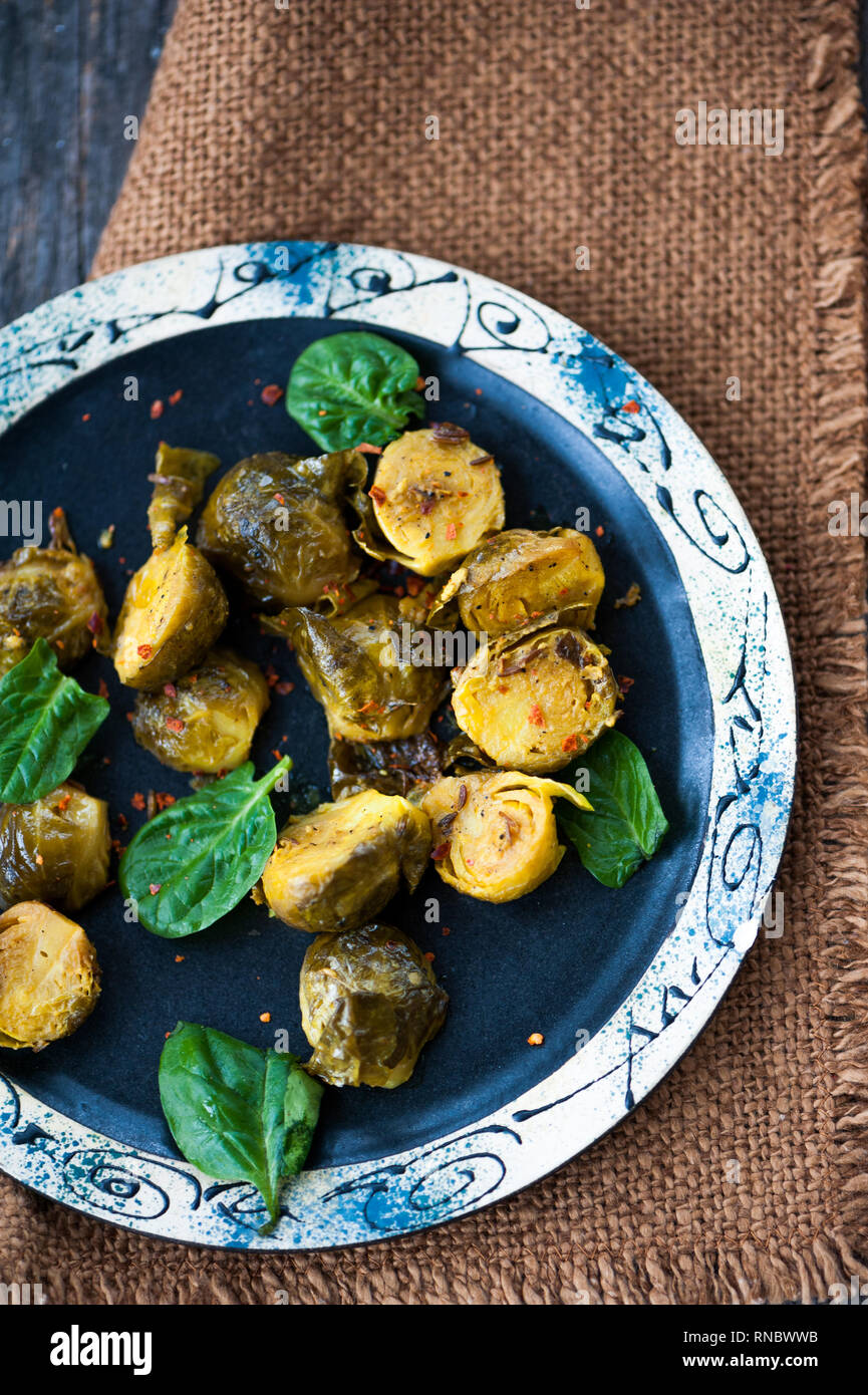 Baked Brussels sprouts with turmeric Stock Photo - Alamy