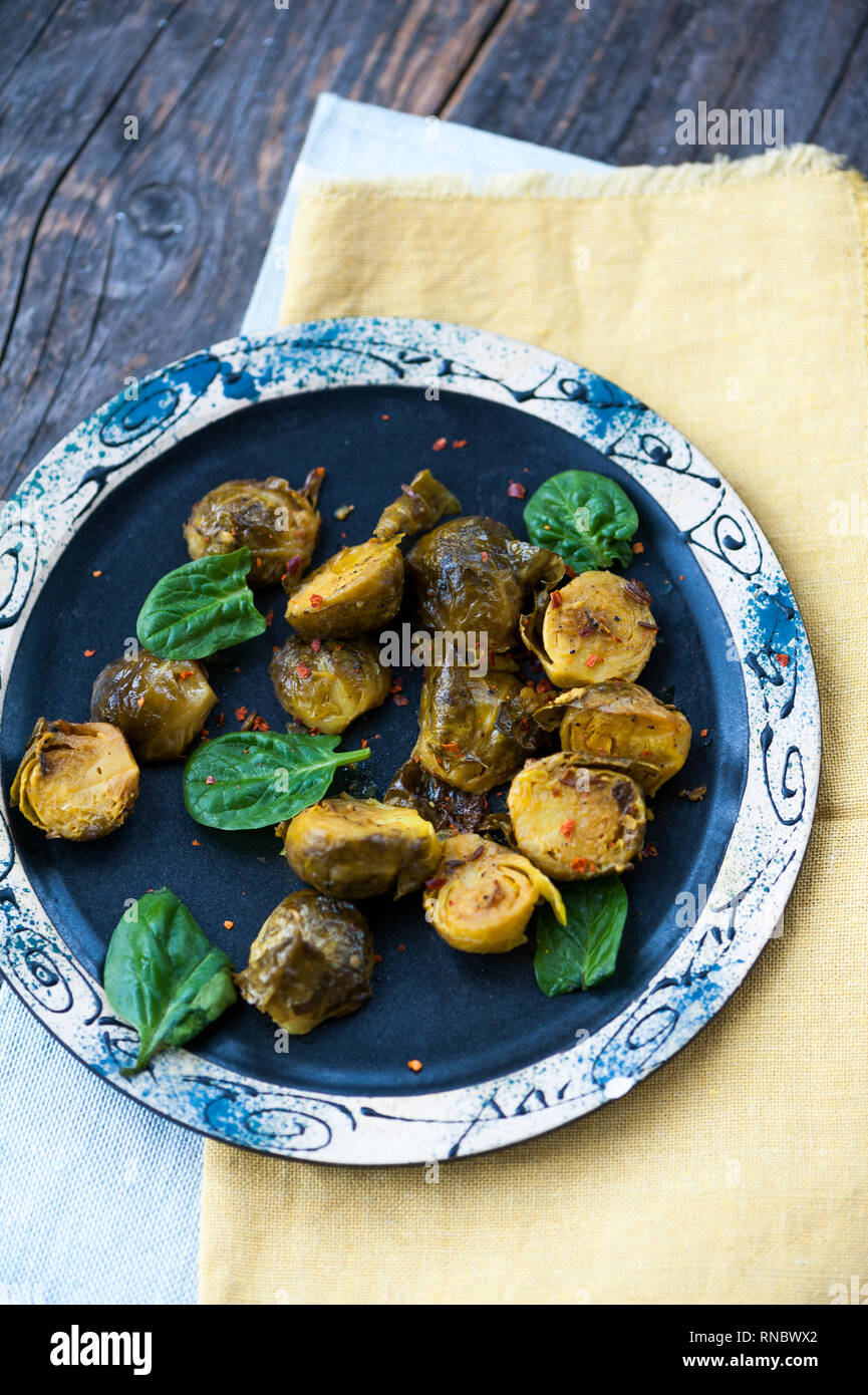 Baked Brussels sprouts with turmeric Stock Photo - Alamy