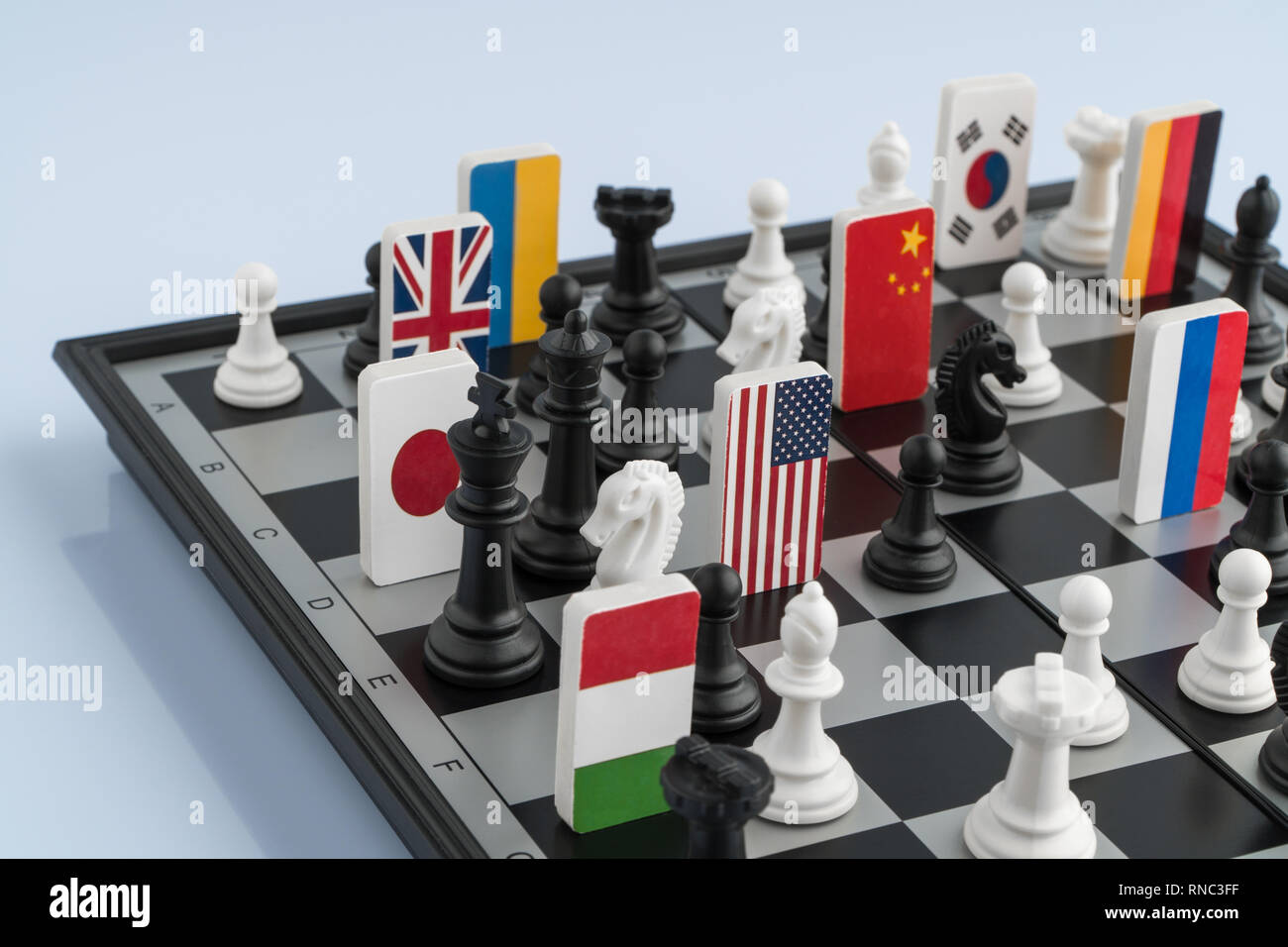 Symbols of the flags of the world on the chessboard. The concept of ...