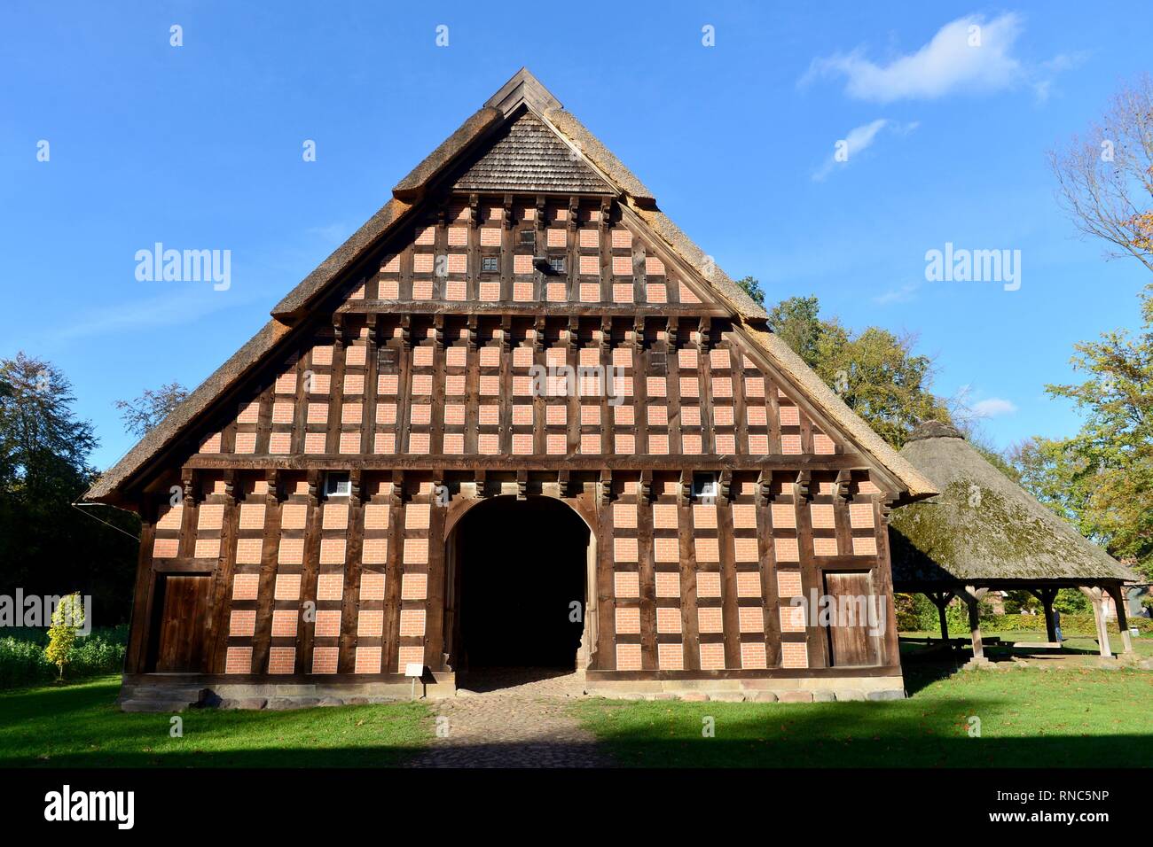 The historic barn of a farm court at the museum village in Cloppenburg ...