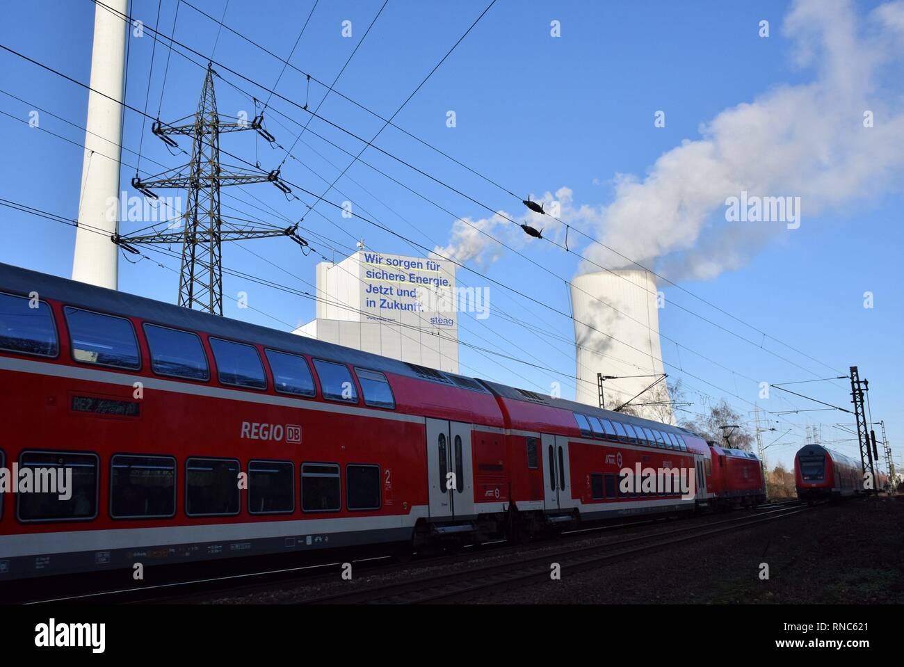 Power plant promoting coal as safe energy and passenger train on 04.12. ...