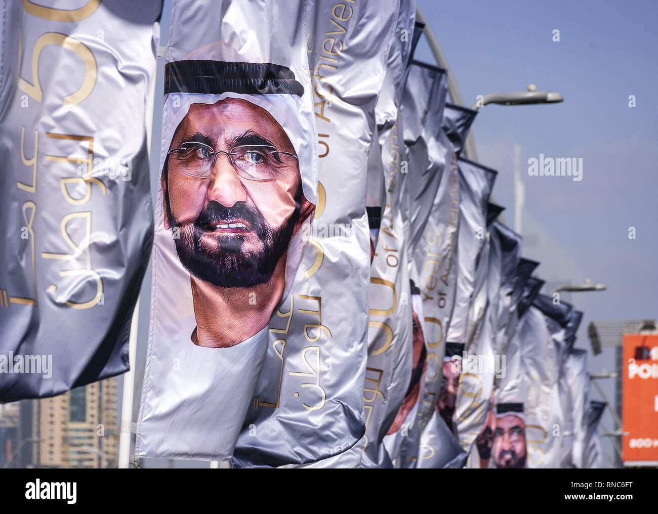 A sea of flags on a large street in Dubai celebrates the ruler of the ...