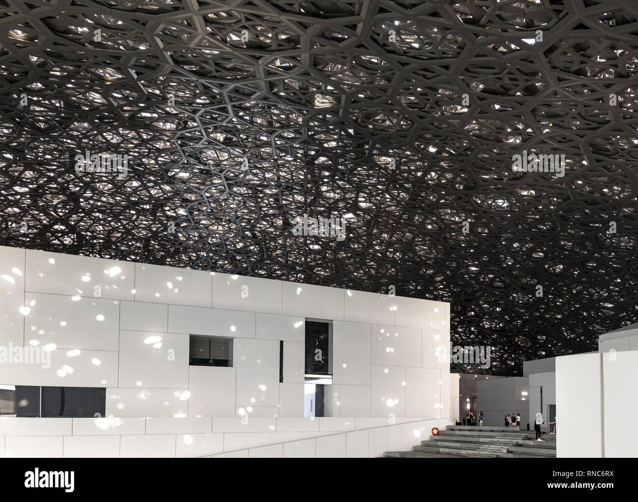 An unusual dome construction made of 8,000 metal stars spans the Louvre ...