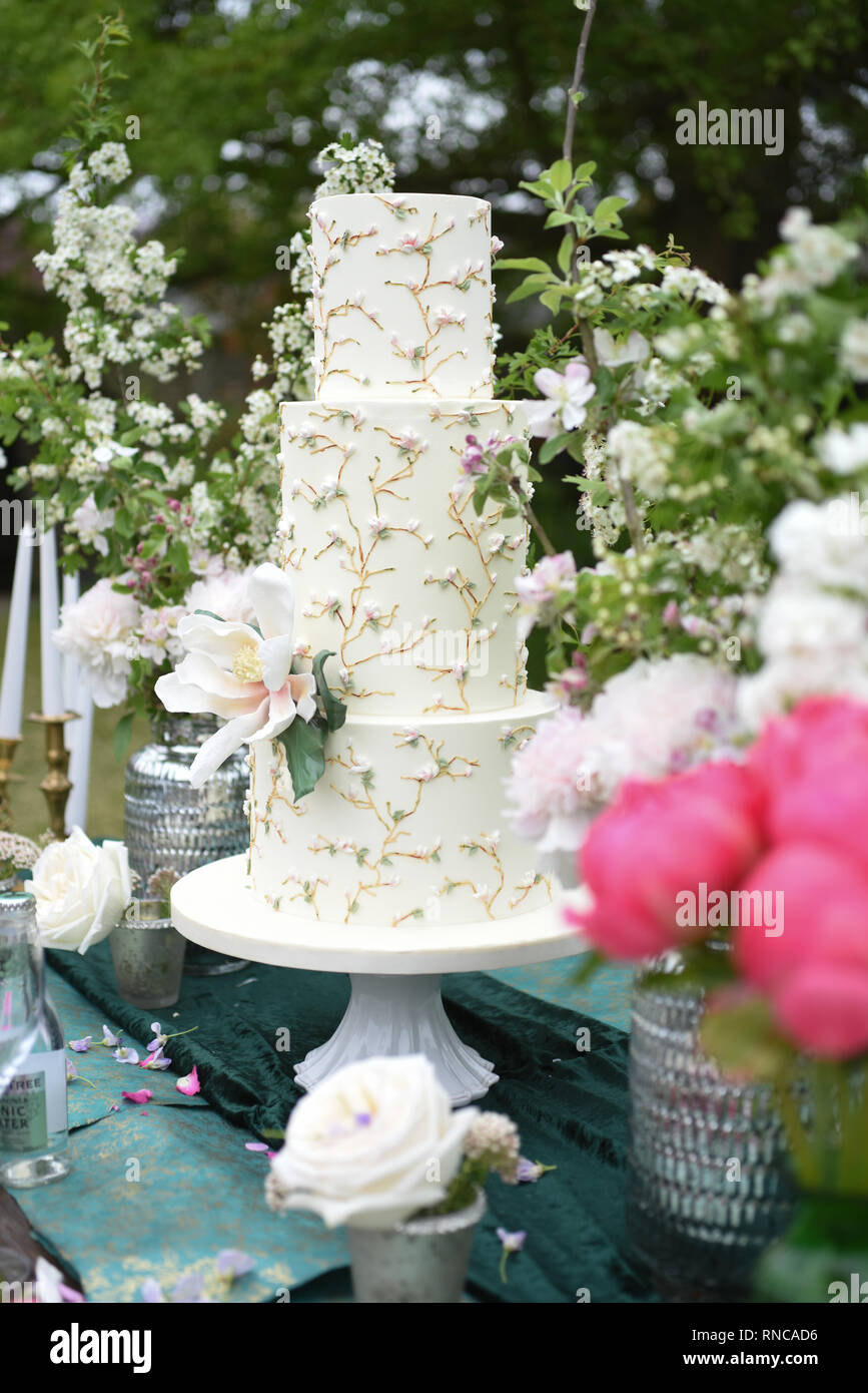 A beautiful outdoor table display, with lots of Spring flowers in ...