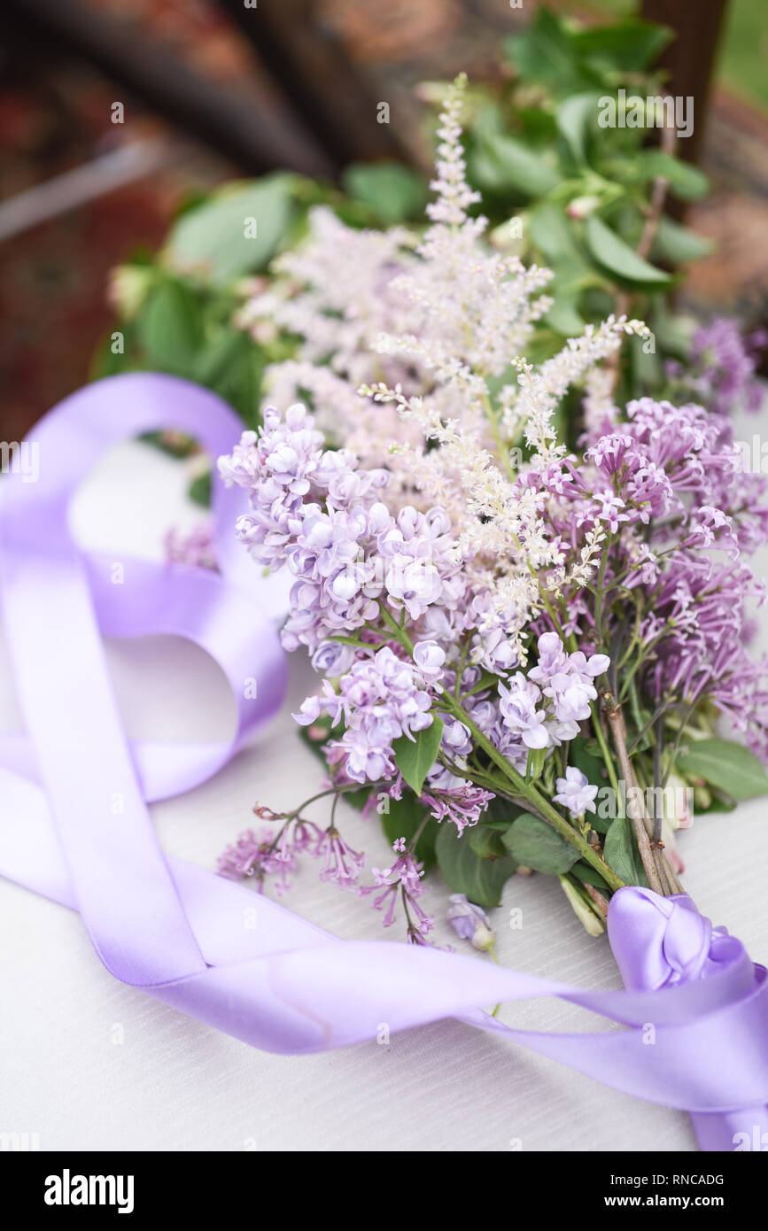 A beautiful outdoor table display, with lots of Spring flowers in ...