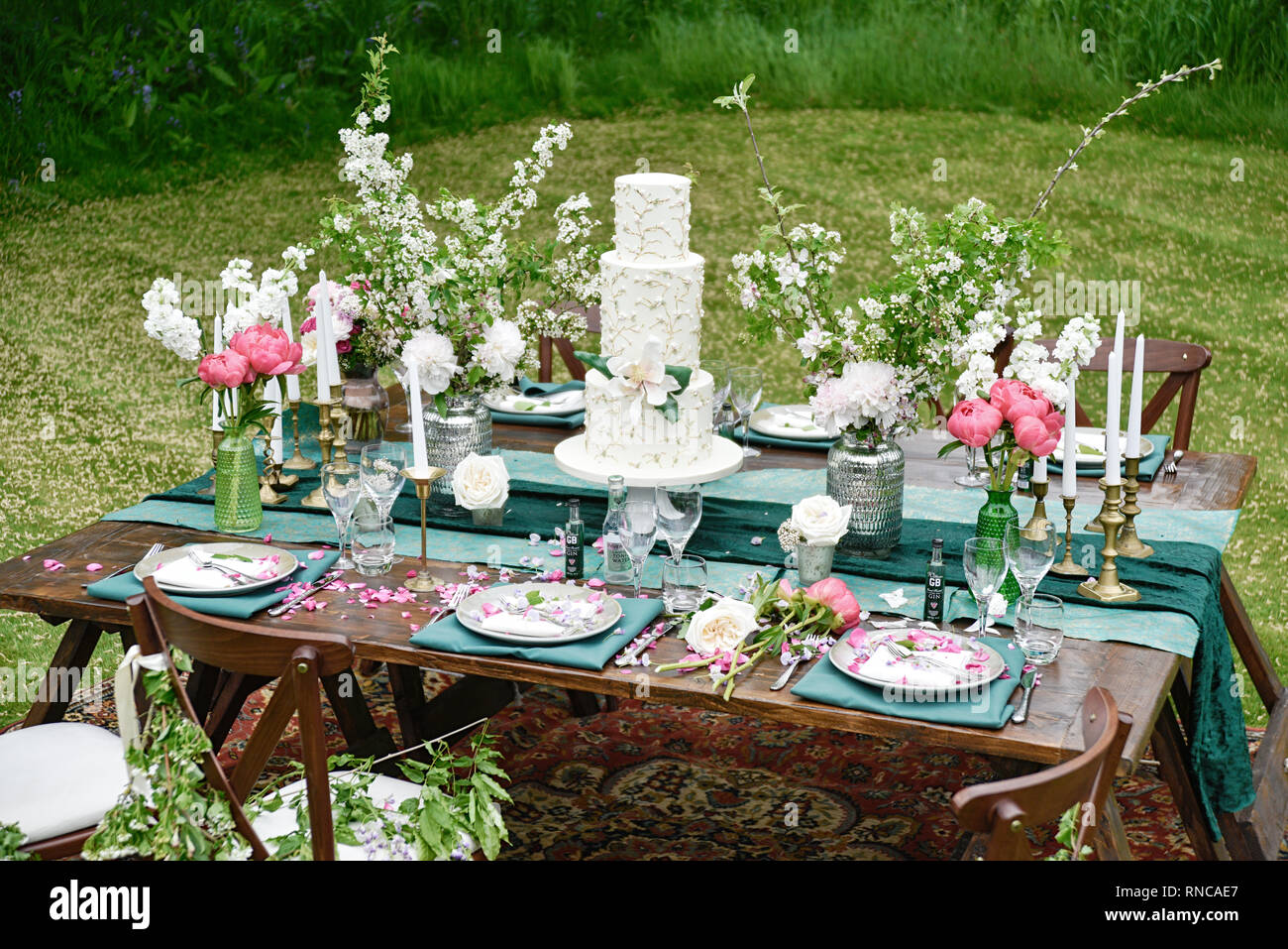 A beautiful outdoor table display, with lots of Spring flowers in ...