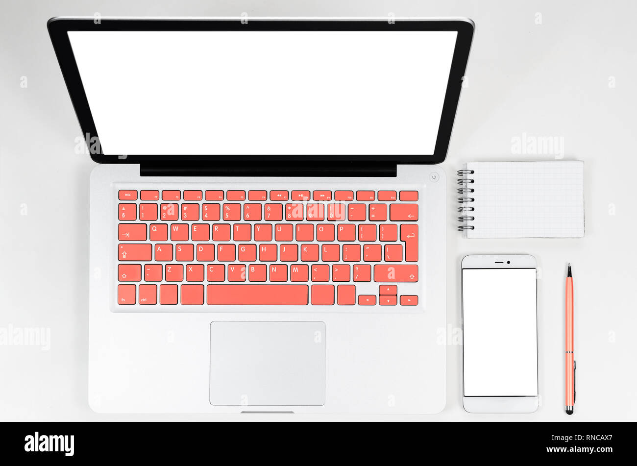 Laptop with smartphone Stock Photo - Alamy
