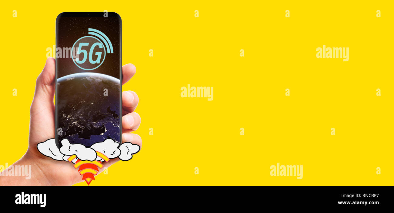 Person holding smartphone yellow hi-res stock photography and images ...