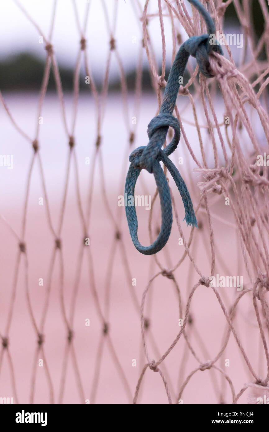 Fishing net with blue cord in Paqueta, Rio de Janeiro, Brazil. 2017 ...