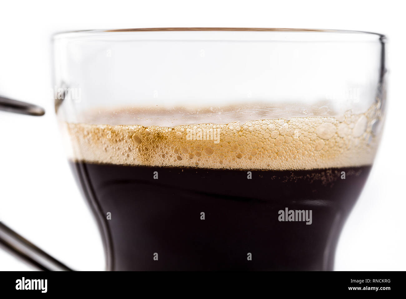 Hot espresso coffee glass isolated on white background. Close up Stock ...