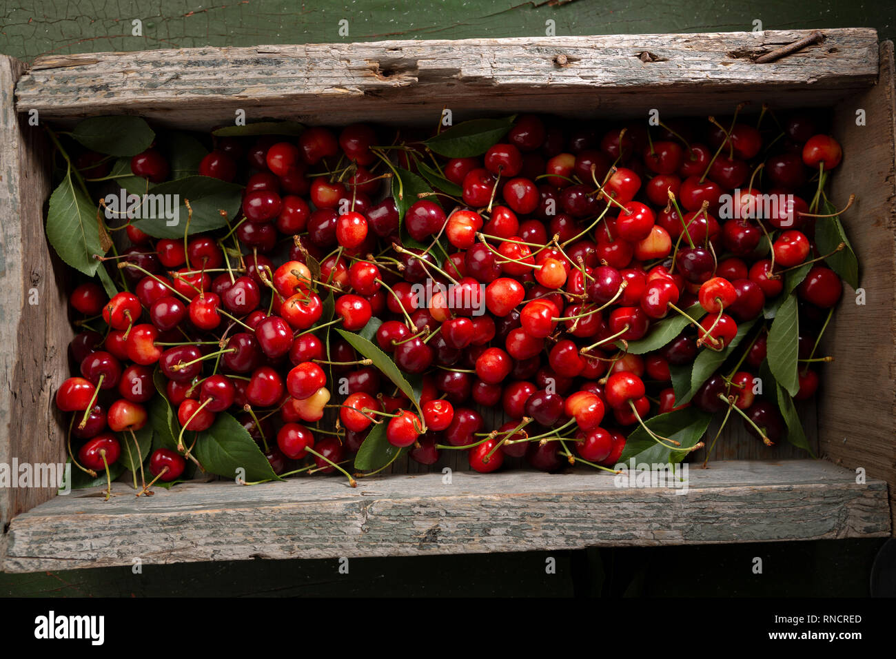 Fresh cherry in box top view Stock Photo - Alamy