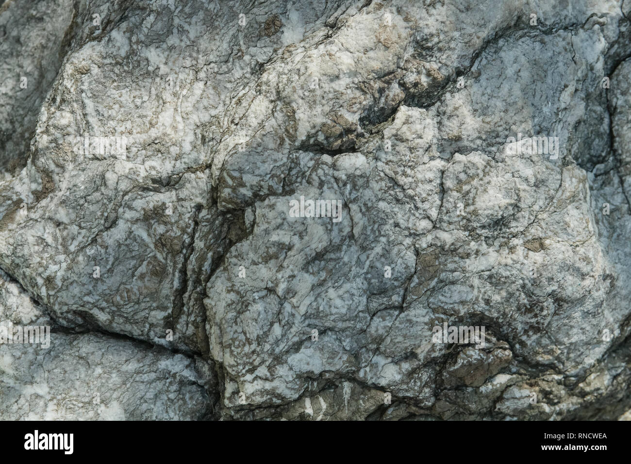 Gray stone, granite texture closeup. Rock wall background, building ...