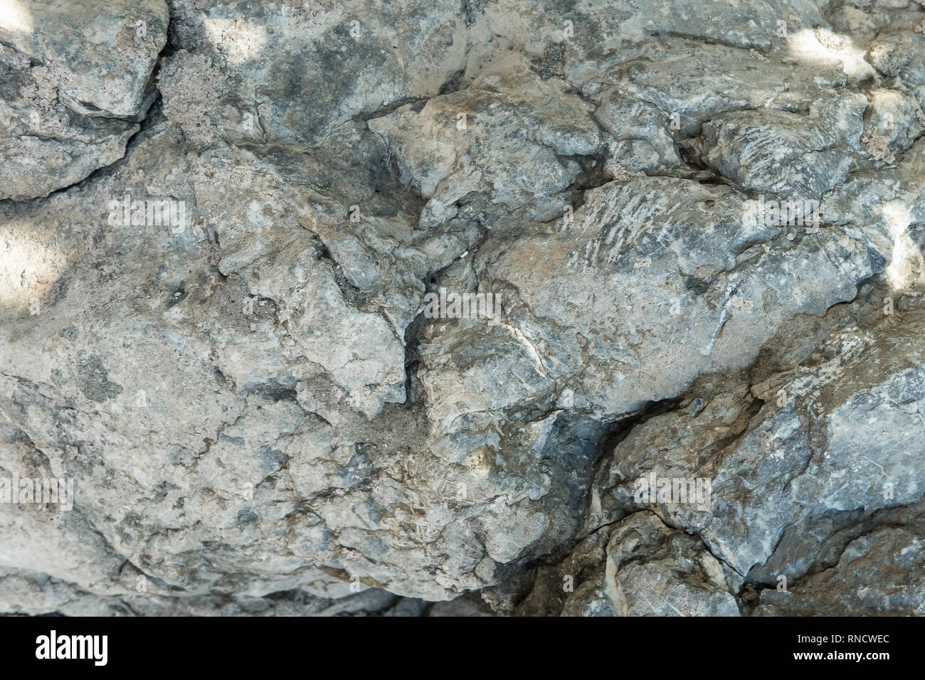 Gray stone, granite texture closeup. Rock wall background, building ...