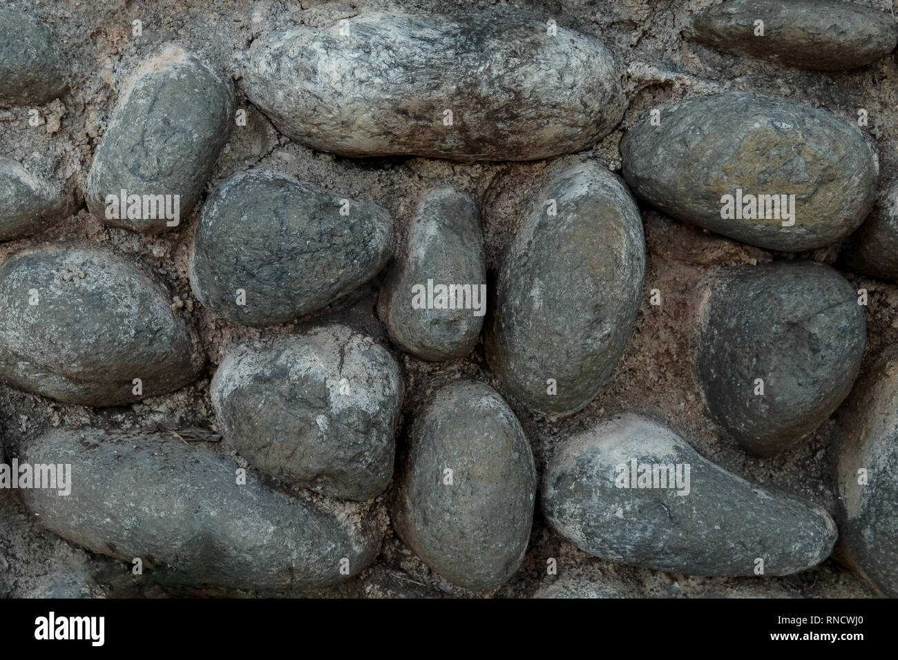 Big gray cobblestones with cement, wall decoration texture, stone ...