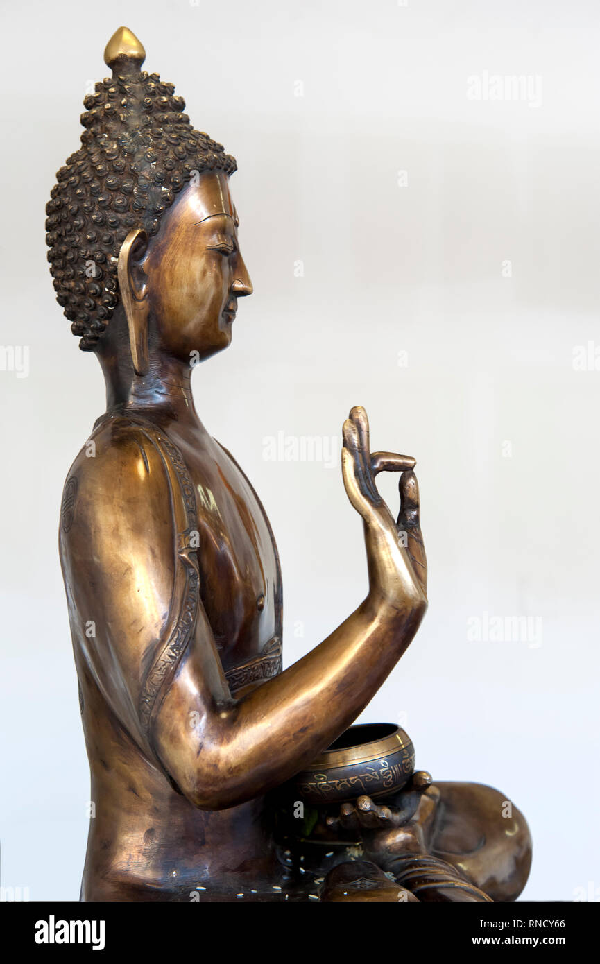 Buddha statue on the white background Stock Photo - Alamy