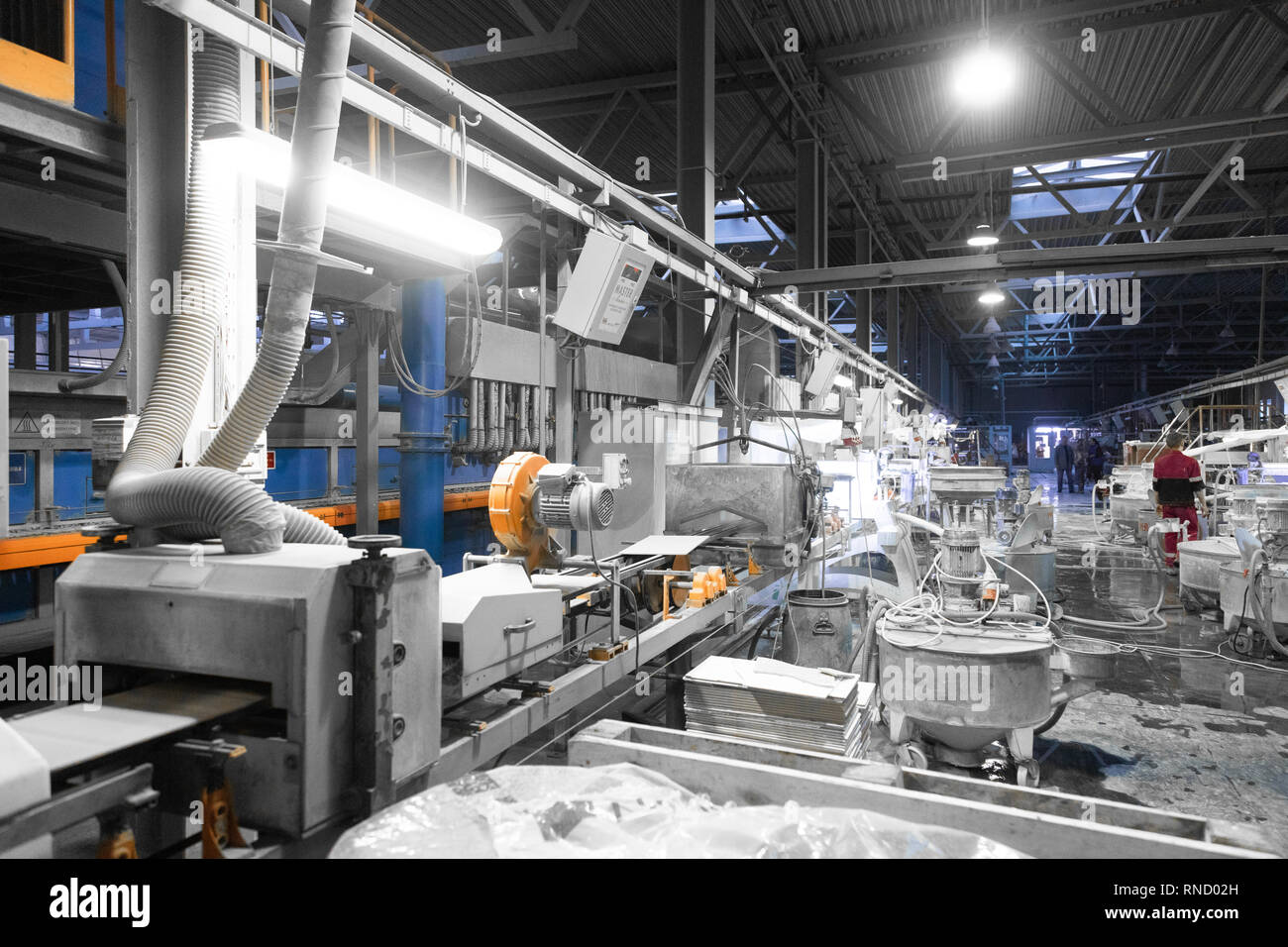 Workers perform their tasks in the shop production plant Stock Photo ...