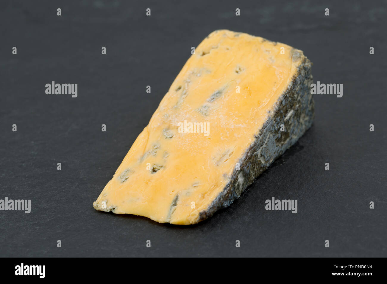 A wedge of Dewlay Nicky Nook Blue cheese made in Garstang Lancashire ...