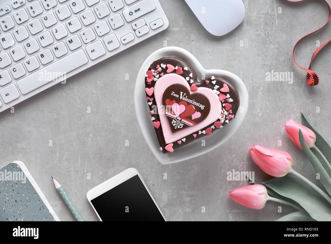 Valentine heart cake with text "Zum Valentinstag" that means "with ...