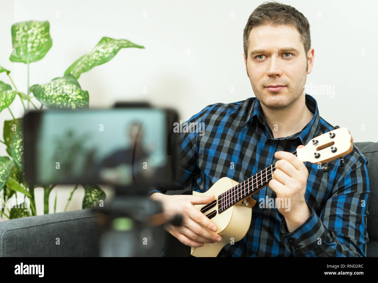 Handsome man recording song. Vlogging concept Stock Photo - Alamy