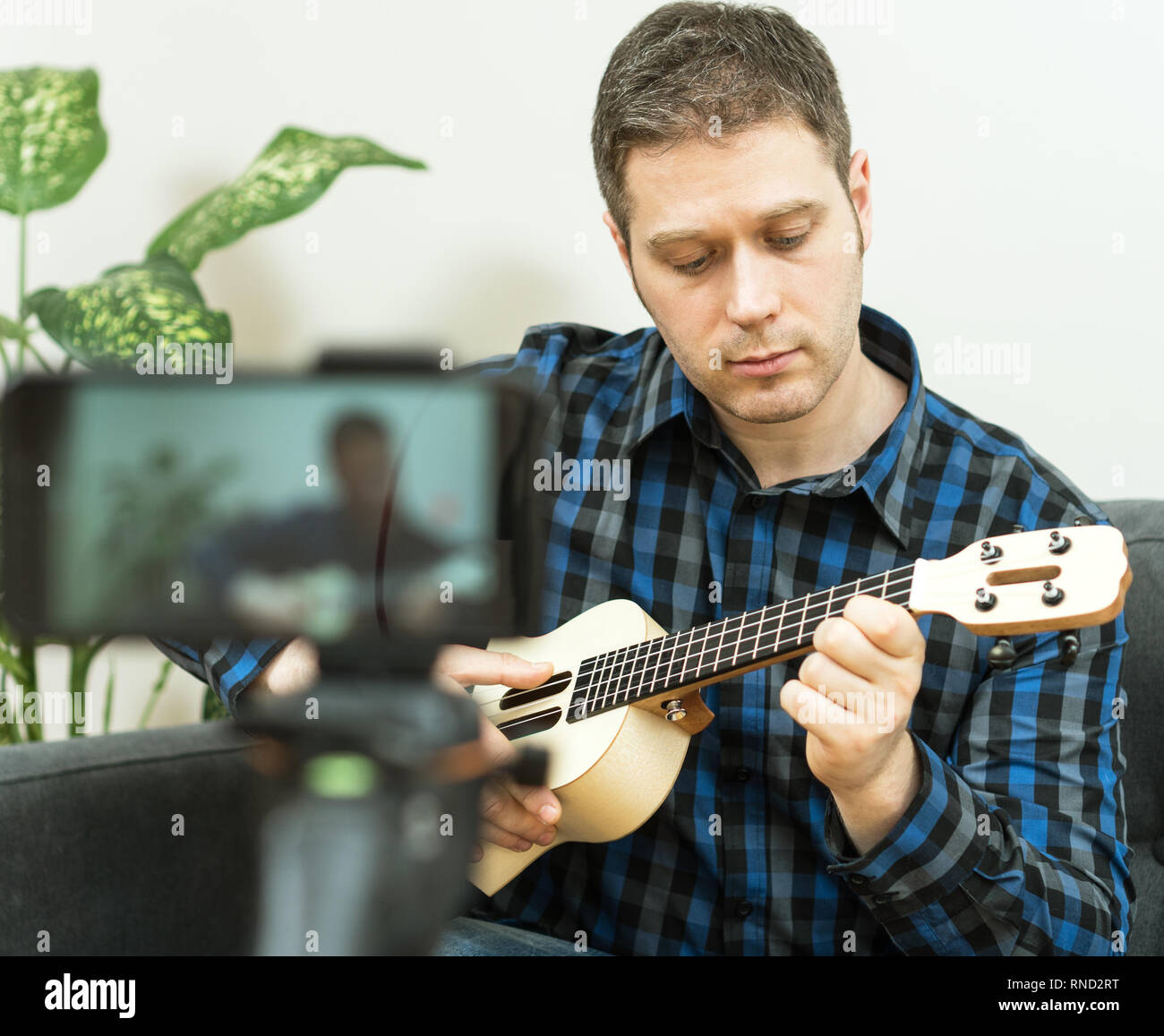Handsome man recording song. Vlogging concept Stock Photo - Alamy