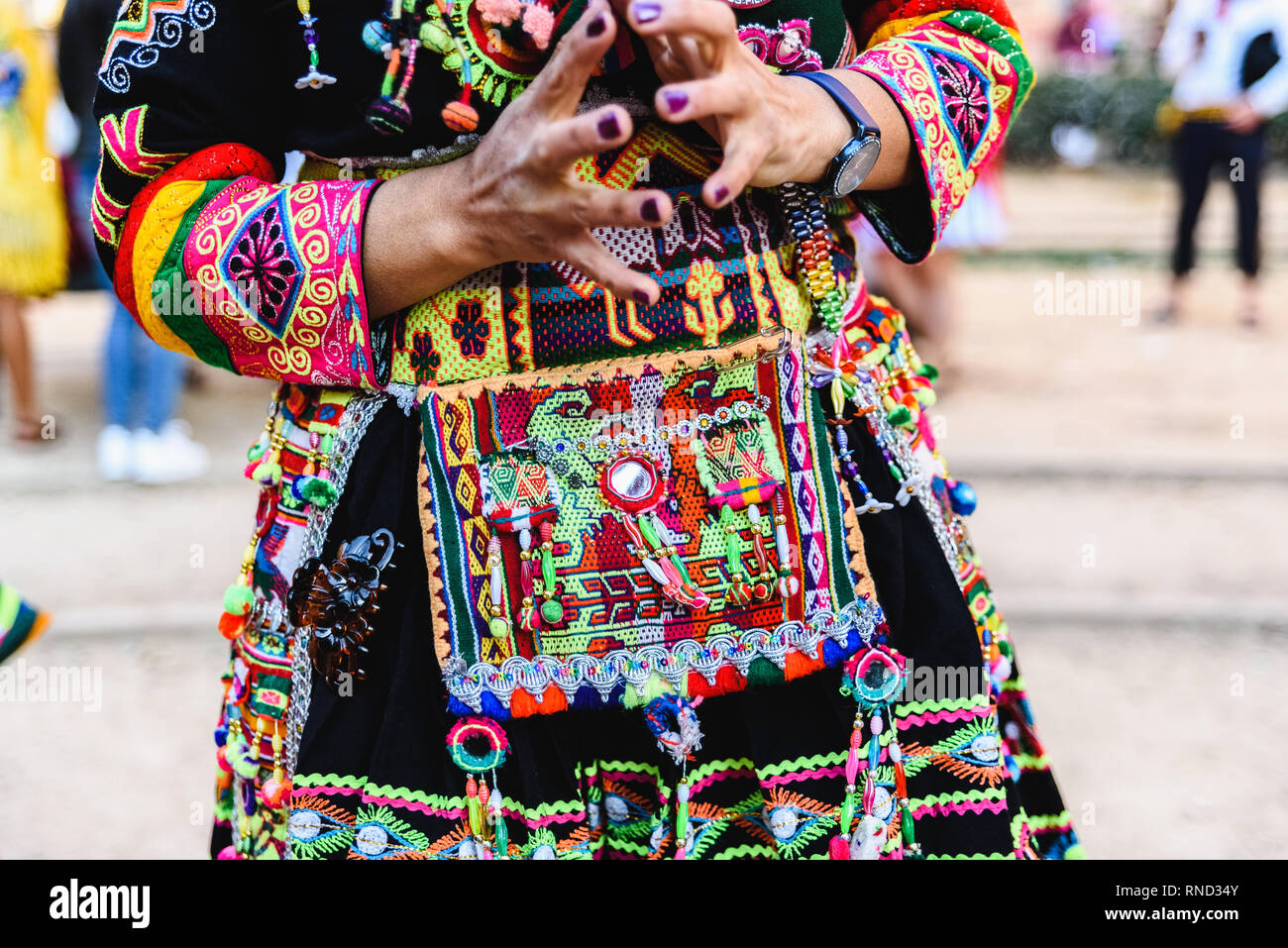 Detail of the colorful embroidery of a typical costume from the Andean ...