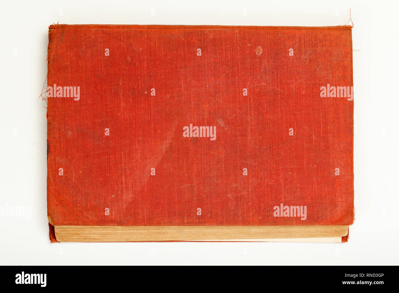 Red old book with battered cover on white background Stock Photo - Alamy