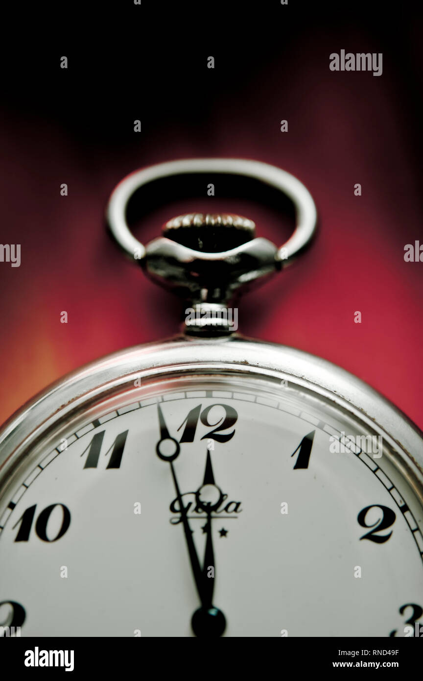 pocket watch indicating two minutes to midnight, concept for doomsday ...